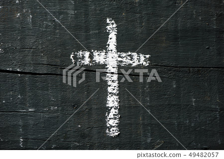 christian cross on a dark gray wooden surface - Stock Photo [49482057 ...