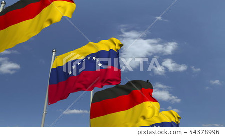 Waving flags of Venezuela and Germany on sky... - Stock Illustration ...