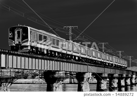 Commuter train E129 series image crossing an... - Stock Illustration ...