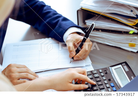 Bookkeeper or financial inspector and secretary... - Stock Photo ...