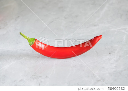 One hot chili pepper on grey marble background, - Stock Photo [58400282 ...