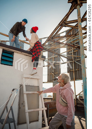 Helping Hold The Ladder