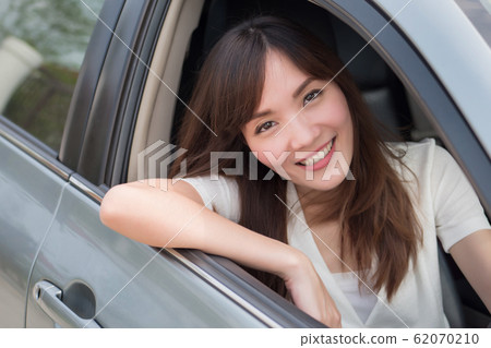 happy woman driving personal car; portrait of - Stock Photo [62070210 ...