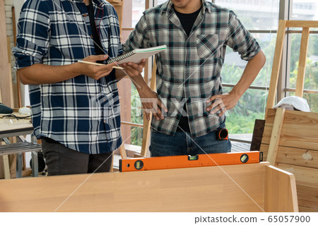 Carpenter working on wood craft at workshop - Stock Photo [65057900 ...