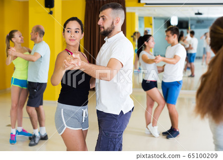 People dancing salsa in studio - Stock Photo [65100209] - PIXTA