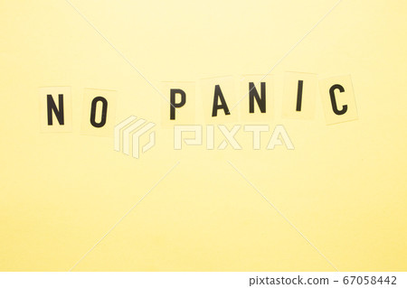 The inscription no panic on a yellow background... - Stock Photo ...