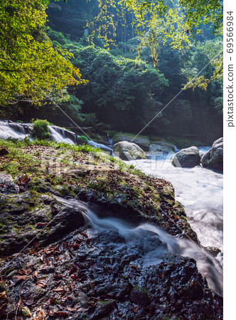 Scenery of a waterfall that falls in the... - Stock Photo [69566984 ...