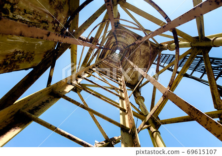 old high metal tower building with stairs... - Stock Photo [69615107 ...