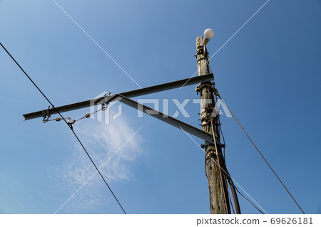Japanese Transmission Pole Train Electricity Post In Japan Under Blue