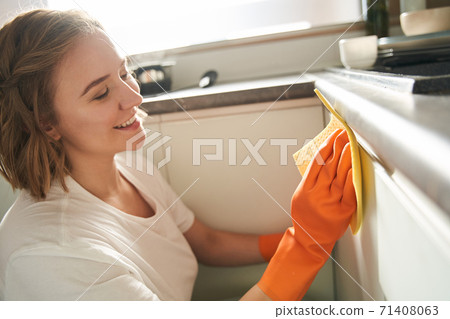 Woman wiping and cleaning surfaces - Stock Photo [71408063] - PIXTA