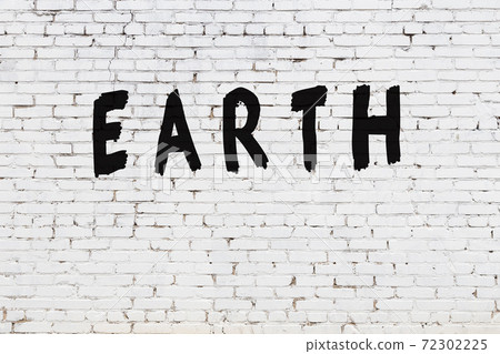 Word earth painted on white brick wall - Stock Illustration [72302225 ...