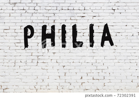 Word philia painted on white brick wall - Stock Illustration [72302391 ...