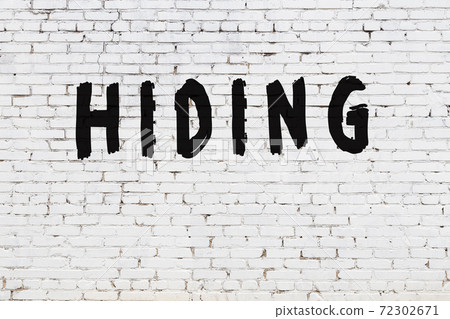 Word hiding painted on white brick wall - Stock Illustration [72302671 ...