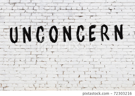 Word unconcern painted on white brick wall - Stock Illustration ...