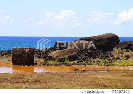 Moai Paro still lying on the coast of Easter... - Stock Photo [74667593 ...