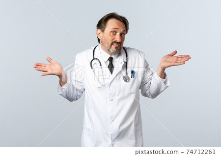 Doctor Shrugging Shoulders