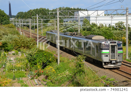 735 series ordinary train that runs as if... - Stock Photo [74981241 ...