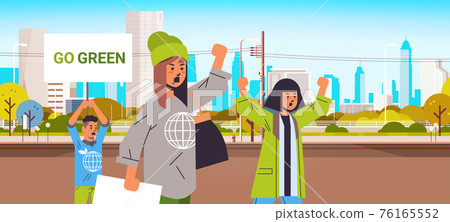 environmental activists holding posters go green save planet strike ...