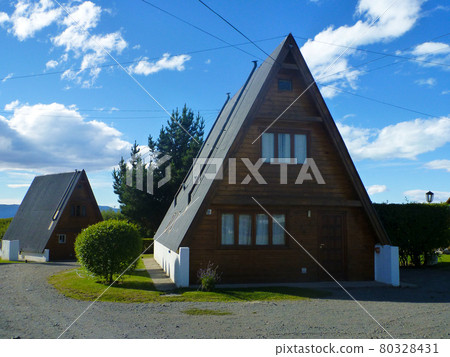Log Cabin With Steep Roofs