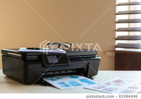 Front view of a black printer machine on a table-照片素材（圖片） [81994846 ...