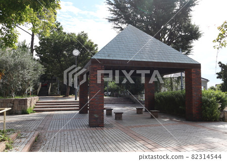 Brick pillar rest area, green trees, hedges,... - Stock Photo [82314544 ...