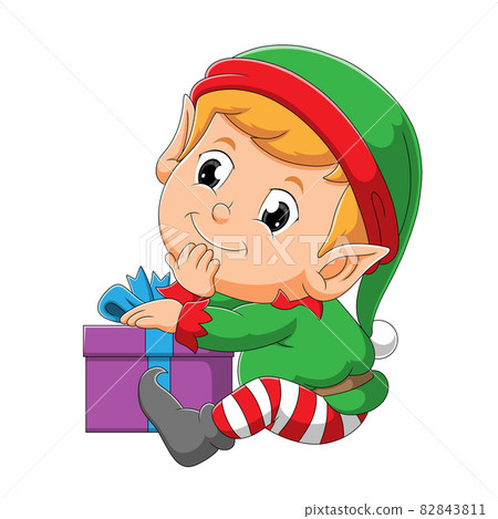 The elf boy with the happy face is sitting near...-插圖素材 [82843811 ...