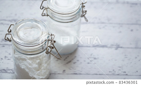 A photo of two white powder seasonings in a... - Stock Photo [83436301 ...