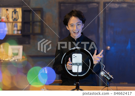 Male youtuber talking to the camera - Stock Photo [84662417] - PIXTA