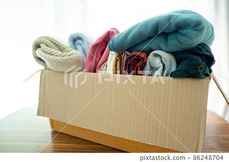Donation box with used clothes at home to... - Stock Photo [86248704 ...