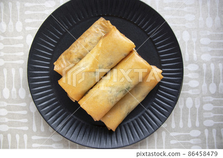 Spring rolls from the top of the black plate - Stock Photo [86458479 ...