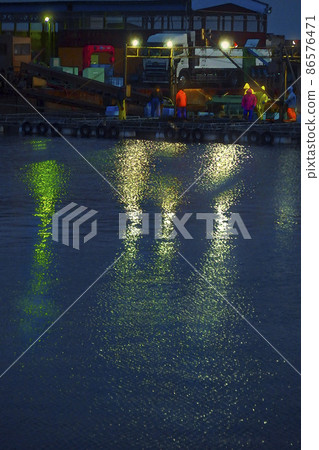 Shipping work from the port cage at dusk - Stock Illustration [86576471 ...