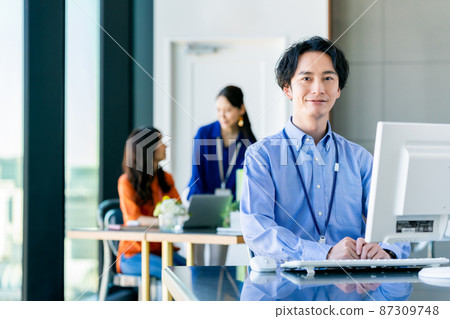 Young male engineer working in the office - Stock Photo [87309748] - PIXTA