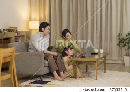 Family computer spent in the living room at night - Stock Photo ...