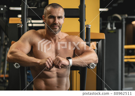 Muscular bodybuilder during his workout in the gym - Stock Photo ...
