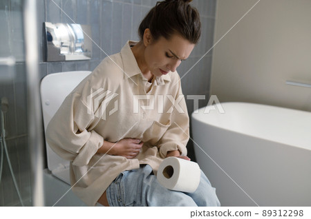 Young Woman On Toilet