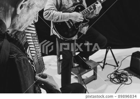 Two senior men, musicians playing electric... - Stock Photo [89896834 ...