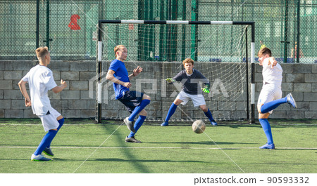 Teens playing soccer football match.... - Stock Photo [90593332] - PIXTA