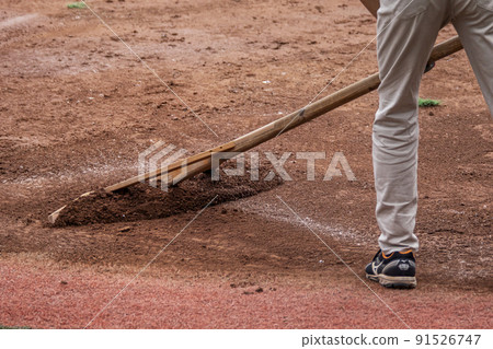 Ground maintenance using dragonfly rake to... - Stock Photo [91526747 ...