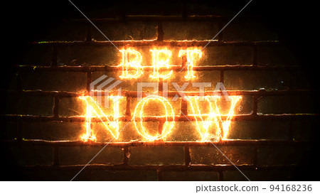 Bet Now glowing fiery inscription on brick wall... - Stock Illustration ...