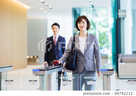 A business person passing through the security... - Stock Photo ...