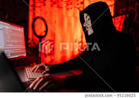Side view of wanted hacker man wearing... - Stock Photo [95216025] - PIXTA