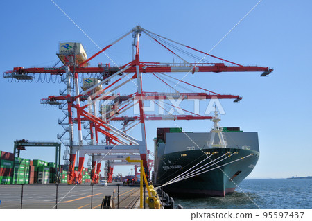 Container wharf cranes and cargo ship loading... - Stock Photo ...