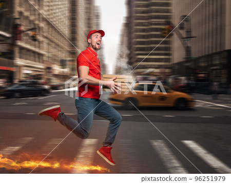 Messenger in red uniform runs on foot really... - Stock Photo [96251979 ...
