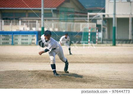 Left-handed pitcher pitching in a practice match (high school baseball ...