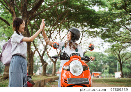 Two Ladies Clapping Hands