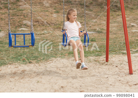 Child Alone In Playground