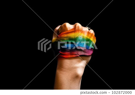Rainbow colors painted hand raised making fist... - Stock Illustration ...