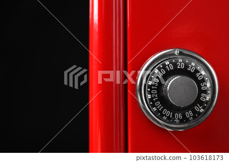 Red steel safe with mechanical combination lock... - Stock Photo ...