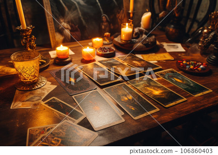 Tarot cards on wooden table. Fortune telling... - Stock Illustration ...