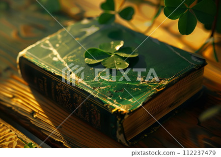 An old book with a green cover with a clover... - Stock Illustration ...